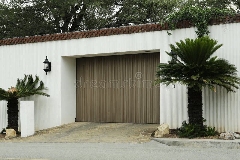 White Wall with Closed Gates and Palms. Exterior Design Stock Photo ...