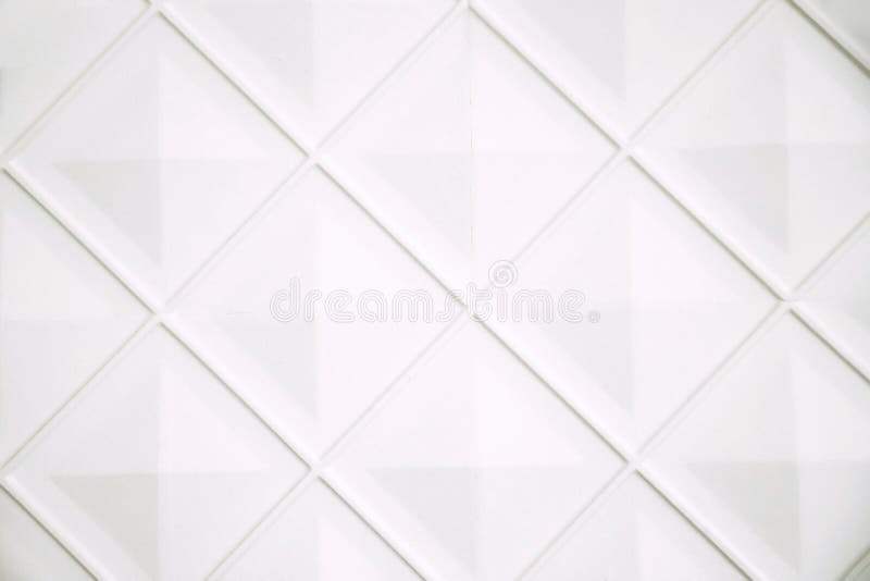 White Wall Decorated with Diamonds. Geometric Shapes in the Interior ...