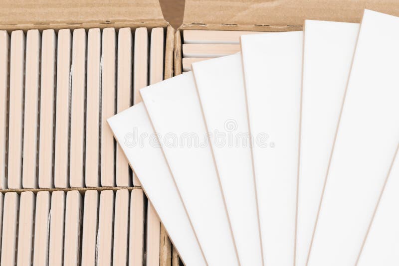 White Wall Tiles Packed in a Cardboard Box, Top View Stock Photo ...