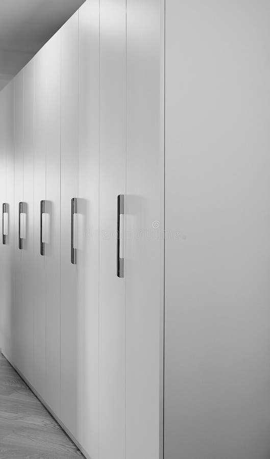 White Wardrobe with Metal Shiny Handles Stock Photo - Image of metal ...