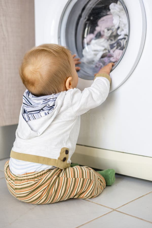 White Washing Machine Keeps Busy the Little Baby Boy Stock Photo ...