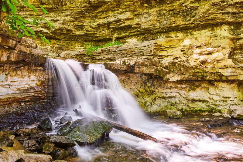 White Waterfall Splashing Off of Rocks in Canyon Stock Photo - Image of ...