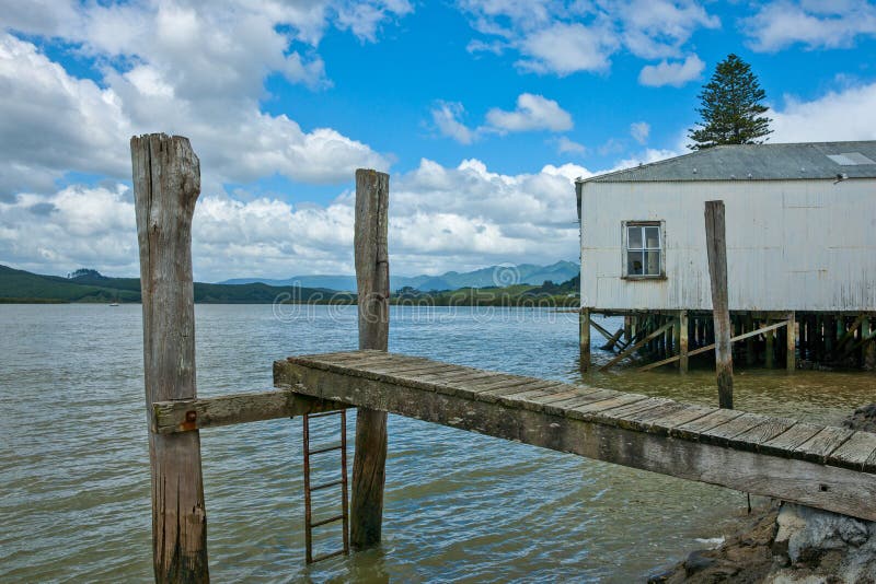 White Waterfront Shed and Old Pier at Rawene Stock Image - Image of ...