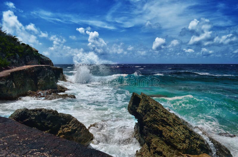 White Waves of the Blue Sea Breaking on the Rocks Stock Image - Image ...