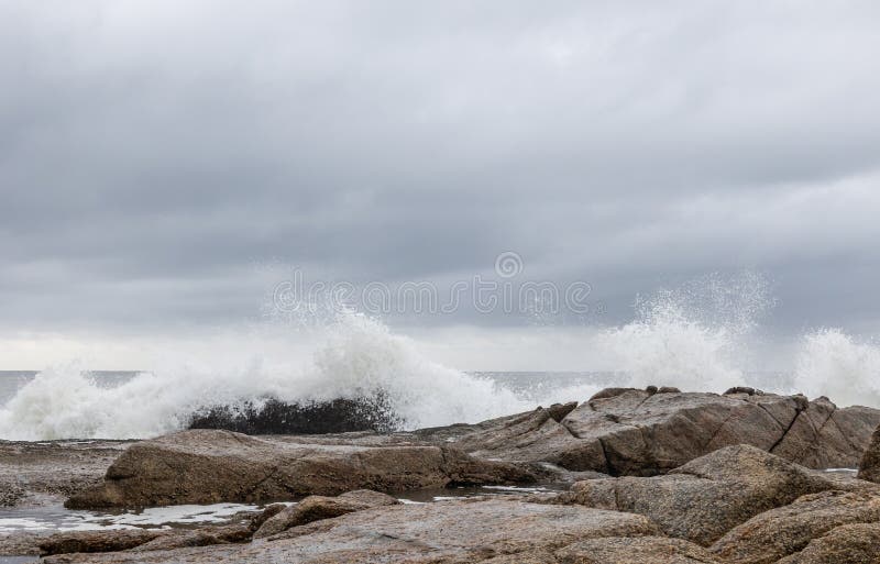 White Waves Splashing Over Rocks Stock Photo - Image of background ...