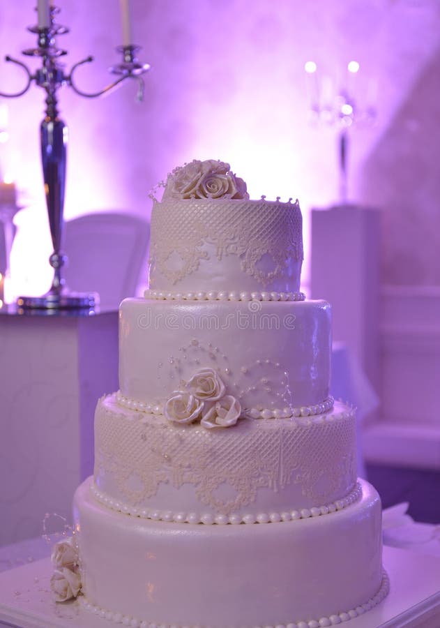 White Wedding Cake on a Table Stock Photo - Image of celebrate, flower ...
