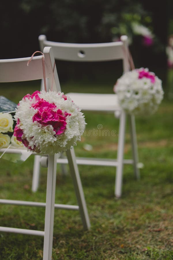 White Wedding Chairs with Beautiful Flower Stock Image - Image of chair ...