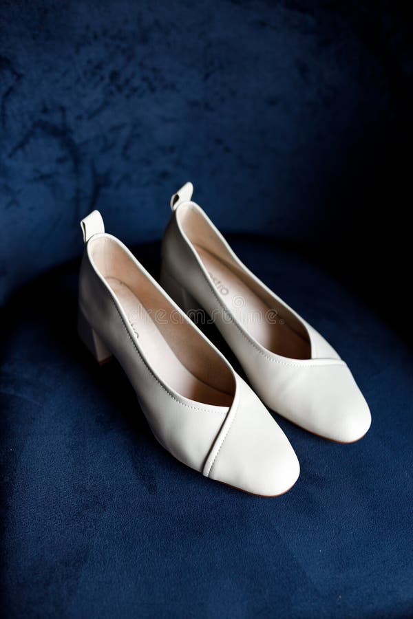 White Wedding Shoes on Blue Velvet Fabric Stock Image - Image of pair ...