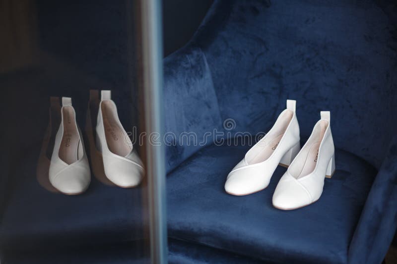 White Wedding Shoes on Blue Velvet Fabric Stock Image - Image of ...