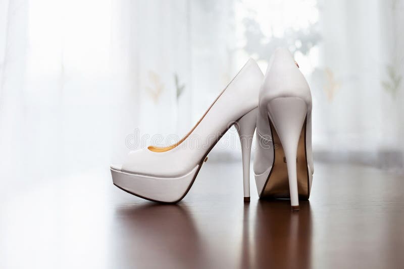 White Wedding Shoes for Women on the Floor Stock Photo - Image of floor ...