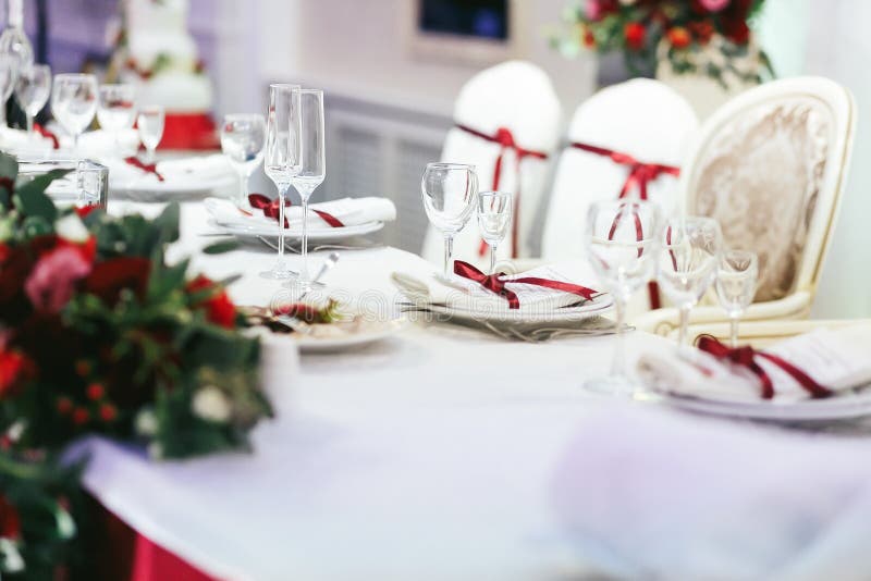 White Wedding Table Set Decorated with Red Ribbons Stock Image - Image ...