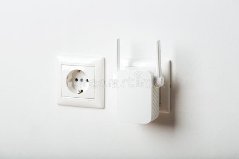 White Wi-fi Repeater Indoors at Home in Outlet. Stock Image - Image of ...