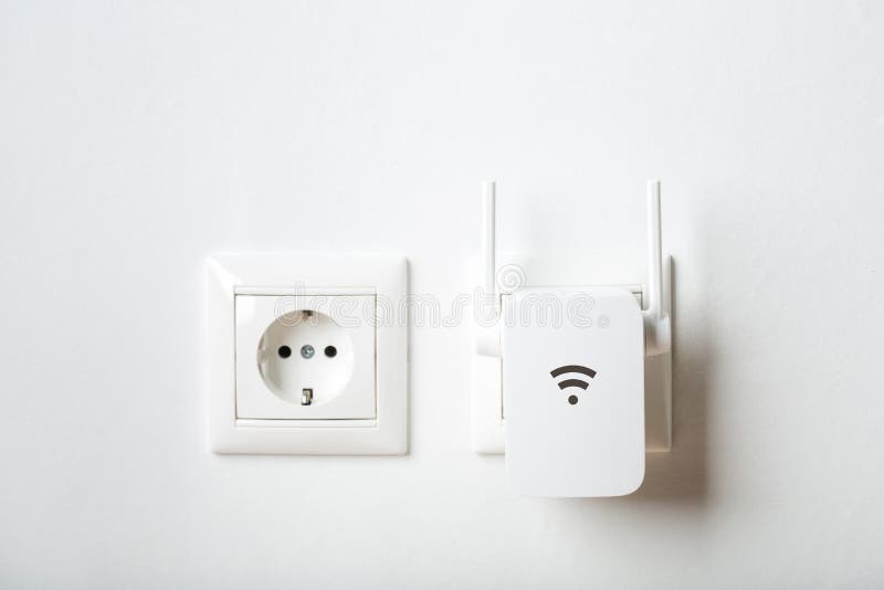 White Wi-fi Repeater Indoors at Home in Outlet. Stock Photo - Image of ...