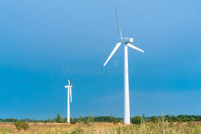 White Wind Power Plants, Two Wind Turbines in the Field Stock Image ...