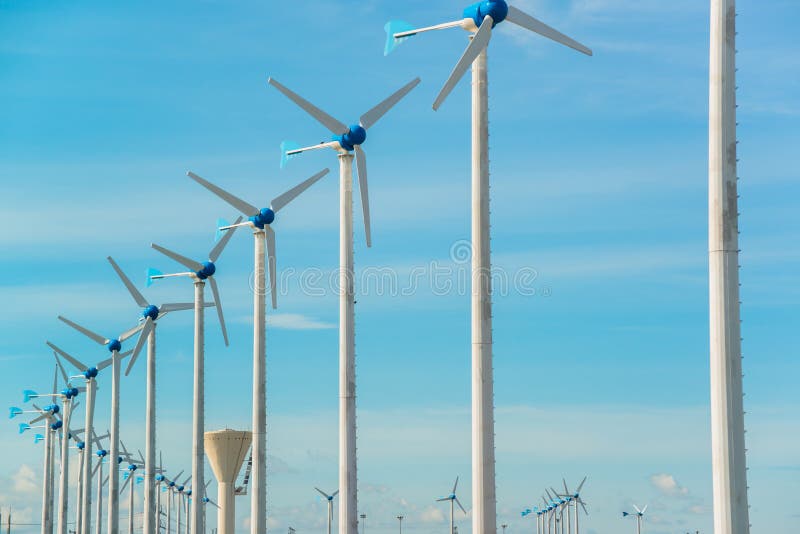 White Wind Turbine in the Line Stock Photo - Image of innovation, field ...