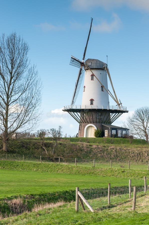 White Windmill on Top of the Stock Photo - Image of agriculture, mill ...