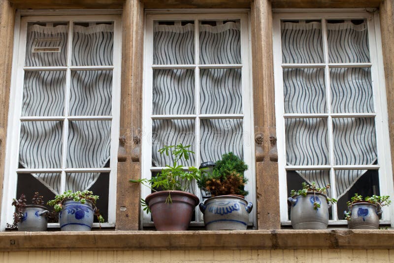 White Window with Flower Pots Stock Photo - Image of built, geranium ...