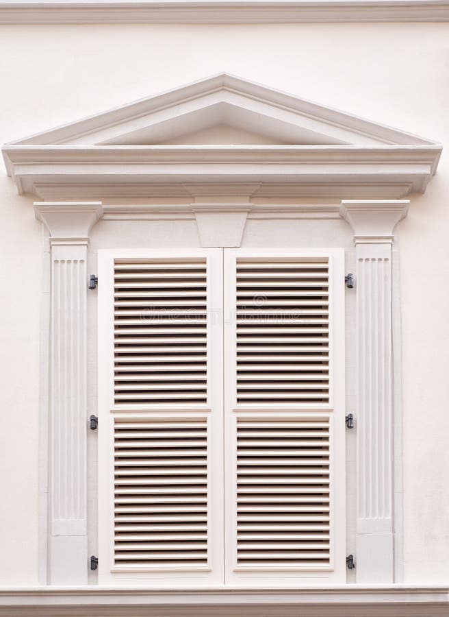 White Wooden Shutters To Protect Windows from Sunlight Stock Photo ...