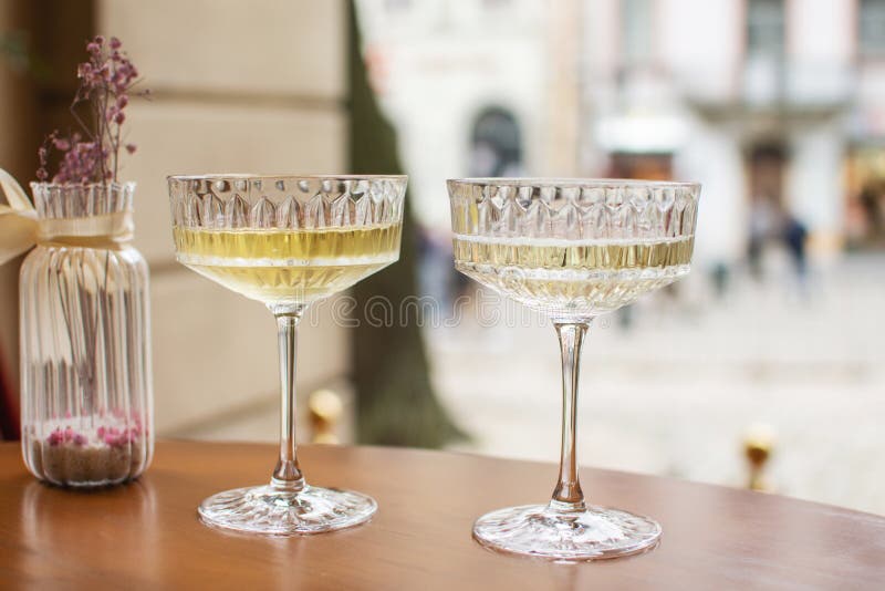 White Wine Glass in an Outdoor Cafe, Spring View in a Restaurant. Stock ...