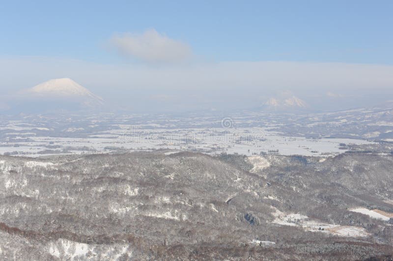 White Winter Landscape with a Snow-covered Volcano Stock Photo - Image ...