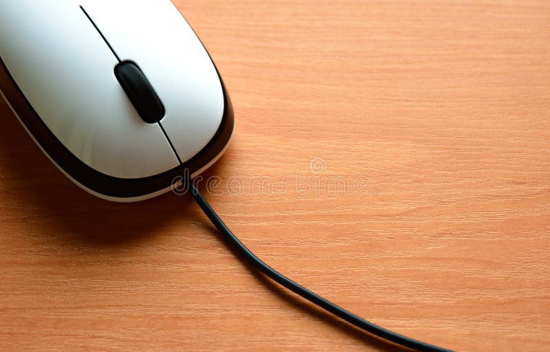 White Wired Computer Mouse on a Wooden Table Stock Photo - Image of ...