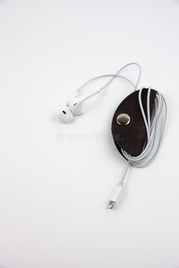 A White Wired Earbuds with Tangled Wires Stock Image - Image of ...