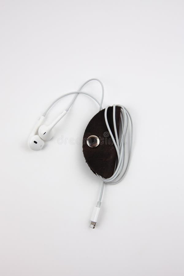 A White Wired Earbuds with Tangled Wires Stock Image - Image of ...