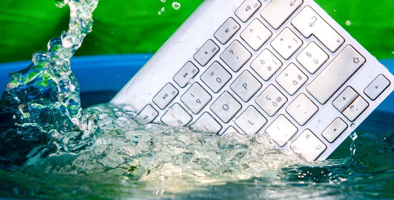 White Wireless Computer Keyboard Falling into the Water Spraying Stock ...