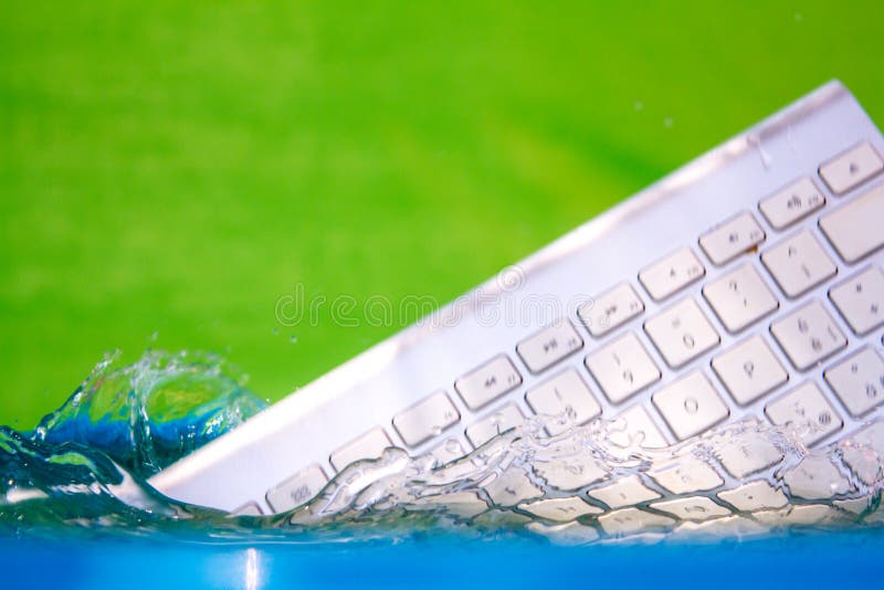 White Wireless Computer Keyboard Falling into the Water Spraying Stock ...