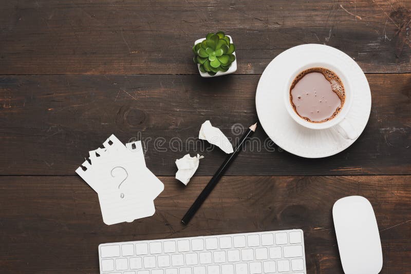 White Wireless Keyboard and Cup of Coffee on a Wooden Brown Table Stock ...