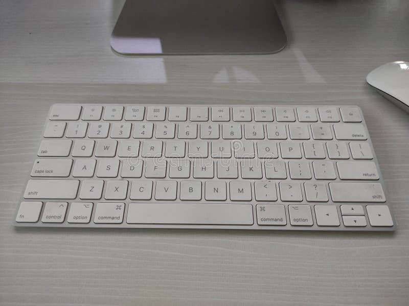 White Wireless Keyboard on the White Textured Wooden Table Editorial ...