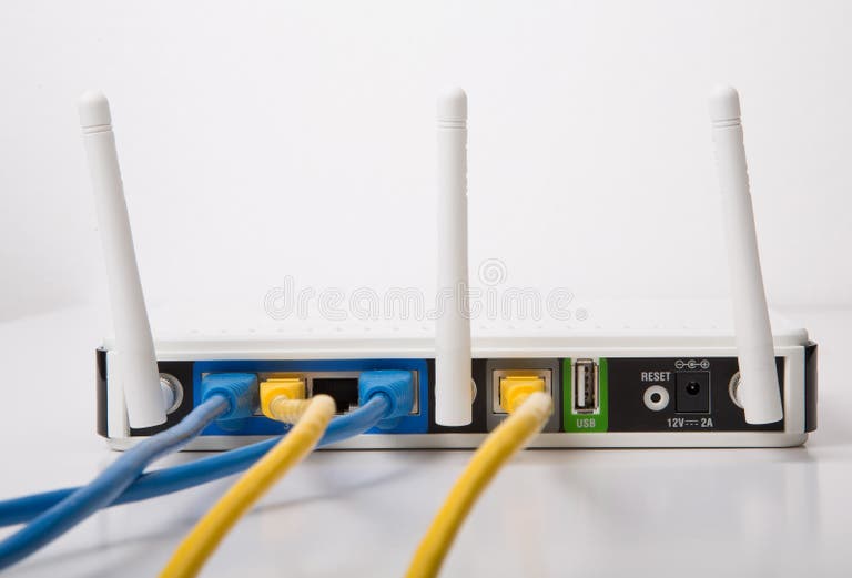 White Wireless Router with Blue and Yellow Cables Stock Image - Image ...
