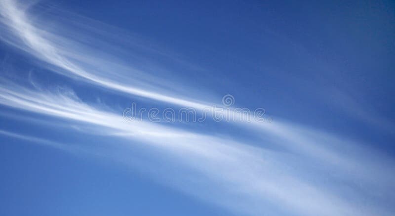 White Wispy Cirrus Clouds in a Blue Summer Sky Stock Photo - Image of ... White Wispy Cirrus Clouds in a Blue Summer Sky Stock Photo - Image of ...