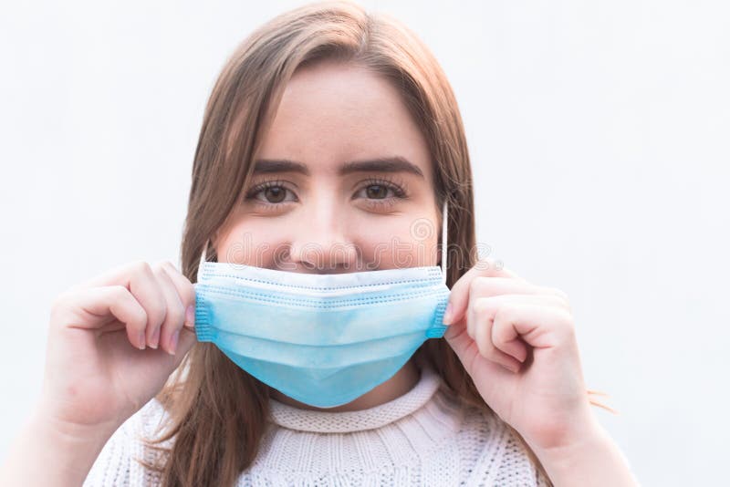 WHITE WOMAN TAKING OFF the MASK Stock Photo - Image of mask, hygiene ...