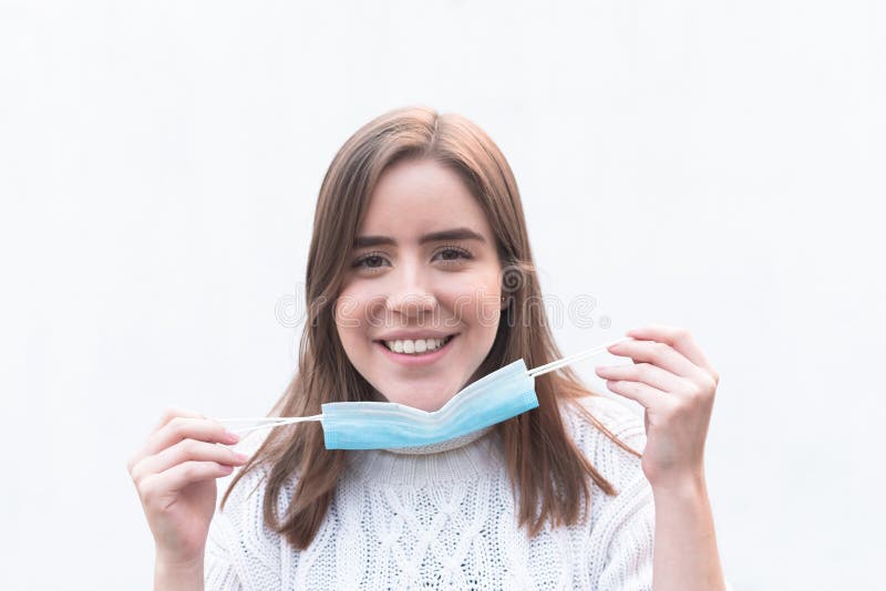White Woman Taking Off the Mask Stock Photo - Image of hygiene, fear ...