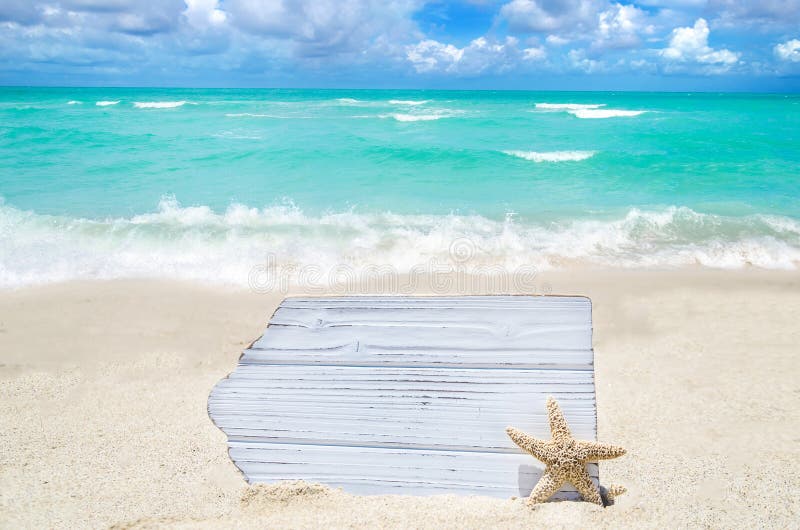 White Wood Board with Starfish on the Sandy Beach Stock Image - Image ...