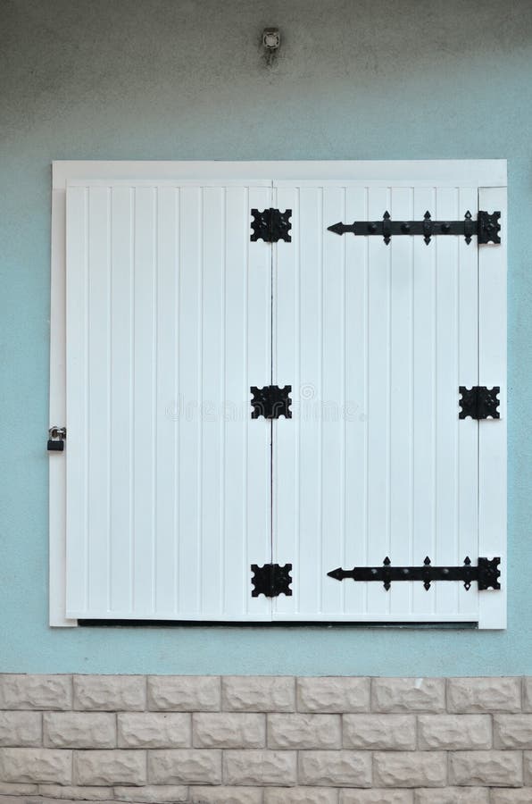 White Wood Windows with Black Iron Fittings Stock Photo - Image of ...