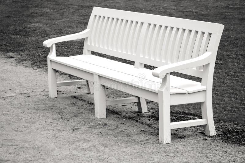 White wooden bench in park stock photo. Image of missing - 131870126