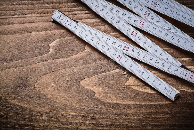 White Wooden Meter on Wood Board Construction Concept Stock Photo ...