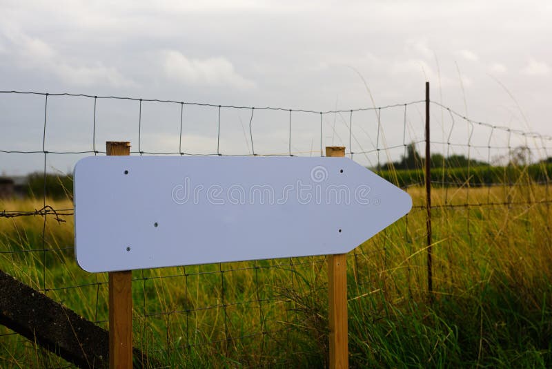 White wooden signpost stock image. Image of decision - 210284245