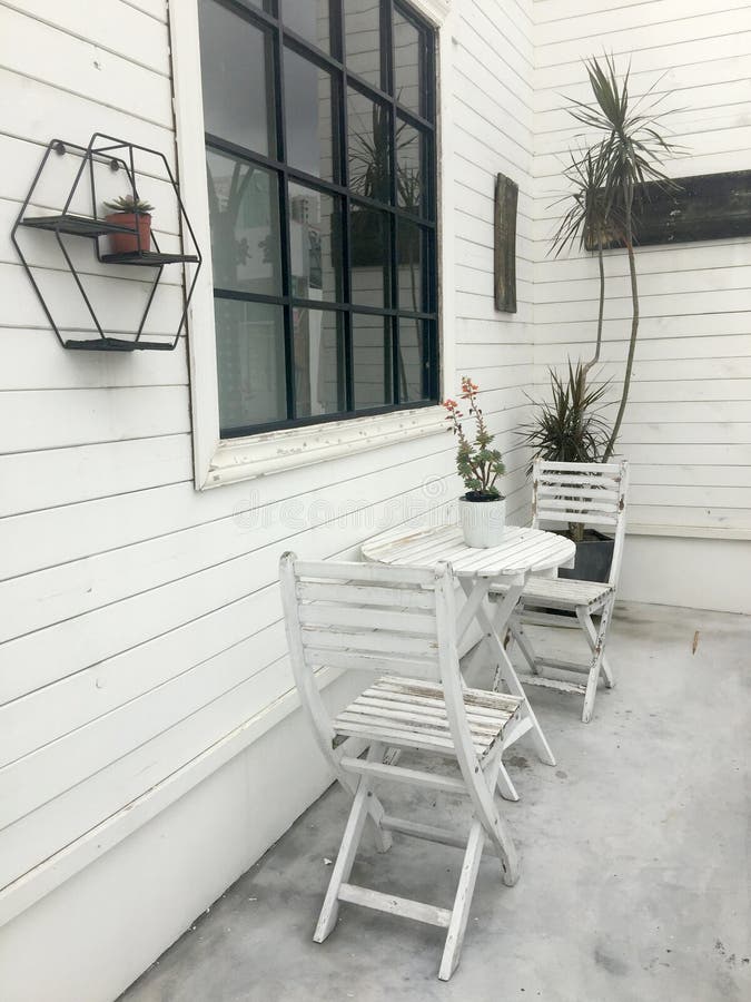 White Wooden Table and Chairs Stock Image - Image of court, home: 148136089