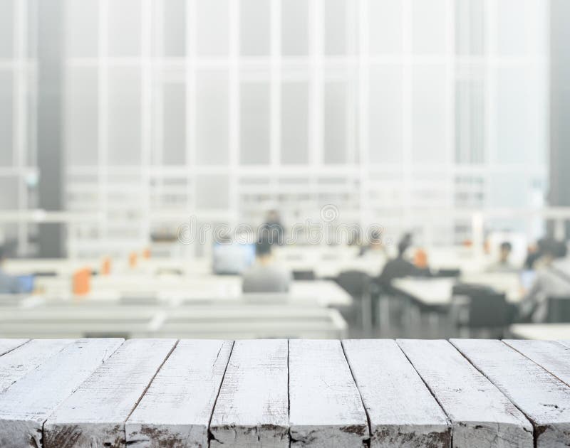 White Wooden Texture Tabletop on Blur Library Background. Stock Photo ...