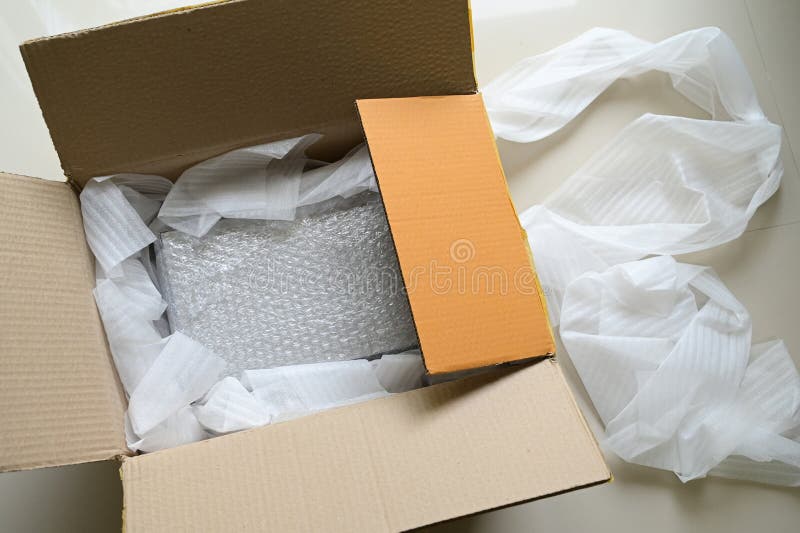 White Wrap Bubble Put in Brown Box Stock Photo - Image of container ...