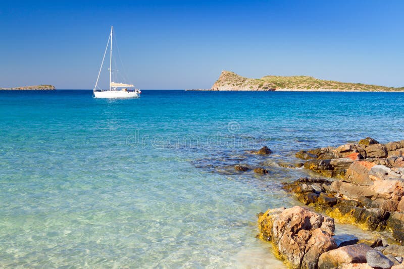 White Yacht on the Idyllic Beach Lagoon of Crete Stock Image - Image of ...