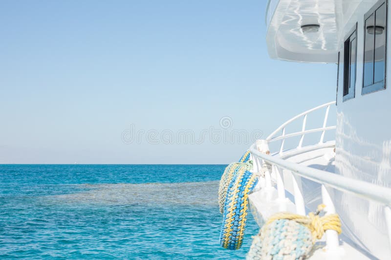 White yacht moving forward stock image. Image of side - 84304531