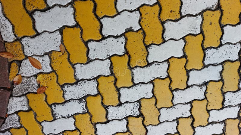 White and Yellow Pedestrian Pathways in an Office Courtyard Stock Photo ...