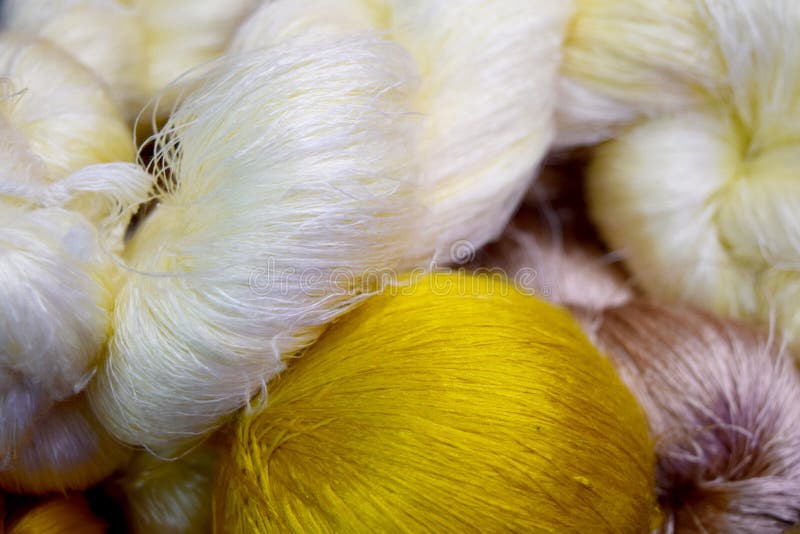 White Yellow Silks Thread Roll Abstract Background Stock Photo - Image ...