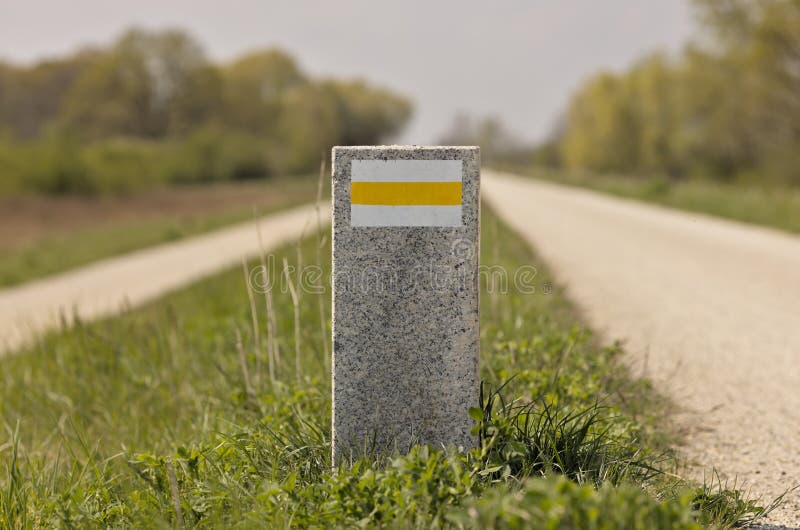 White and Yellow Trail Marker Painted on a Granite Post Stock Photo ...