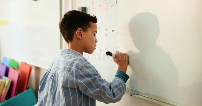 Whiteboard, Education and Kid in Classroom for Learning Math, Problem Solving or Knowledge ...