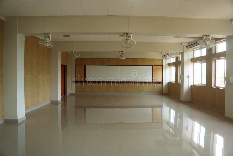 A Whiteboard Mounted in Front of an Empty Classroom Stock Image - Image ...